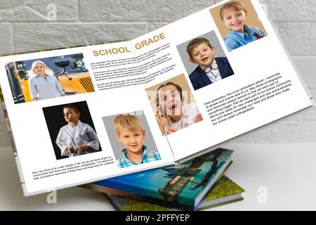Open book, graduation album, photobook Stock Photo - Alamy
