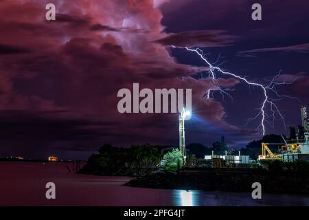 A beautiful shot of a thunder and lightning over an empty road Stock ...