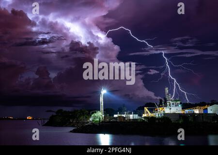A beautiful shot of a thunder and lightning over an empty road Stock ...
