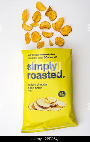 Simply roasted mature cheddar & onion flavoured potato crisps Stock ...