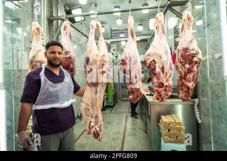 View of hanging mutton meat at a butcher's shop at Souk Baab Makkah ...
