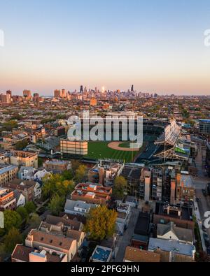 Aerial view of Wrigley Field with Chicago Illinois skyline in ...