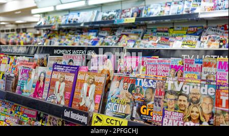 Books and magazines on shop shelves Stock Photo - Alamy