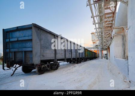 Freight gondola cars for limestone loading stand at factory Stock Photo ...