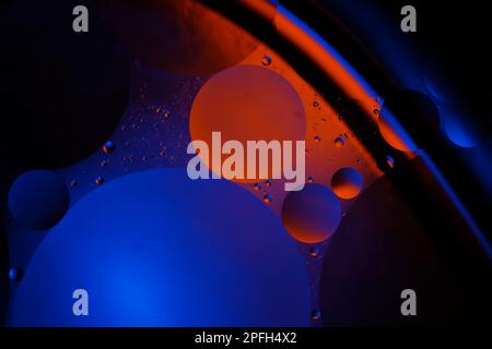 Oil in water, amazing effect, varies colour Stock Photo - Alamy