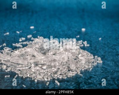 Natural menthol crystals on blue background Stock Photo - Alamy