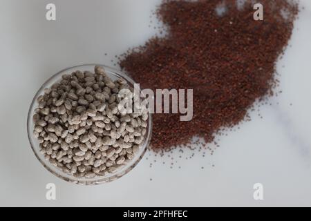 Puffed and roasted finger millet in a bowl. Finger millet is also known ...