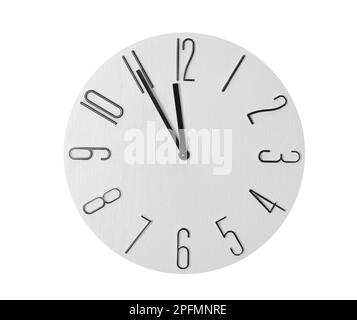 Clock showing five minutes until midnight on white background. New Year ...