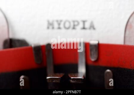 Myopia word written with a typewriter Stock Photo - Alamy