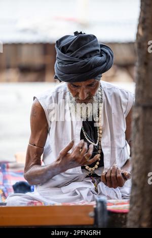 Holy Rishikesh, Portrait of unidentified old brahmin male walking near ...