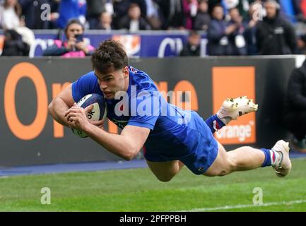 France's Damian Penaud scores their side's fifth try of the game during ...