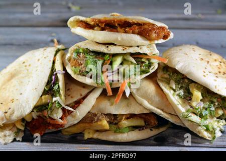 Shami Syrian pita bread with Moussaka which is an eggplant or potato ...