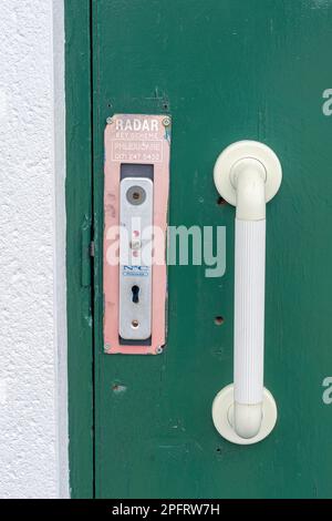UK disabled toilet door with radar lock Stock Photo - Alamy