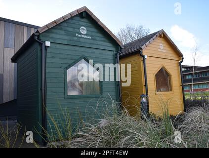 Novel outdoor seating at a pub, made to look like beach huts Stock ...