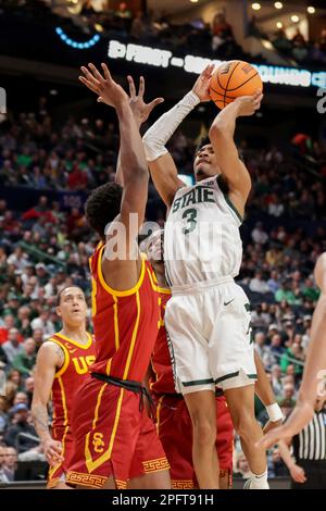 Michigan State guard Jaden Akins, right, drives against Illinois guard ...