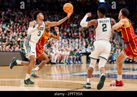 Michigan State guard Jaden Akins, right, drives against Illinois guard ...