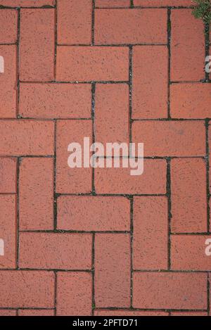 View of texture paving stones of red path called Walking Street, in ...