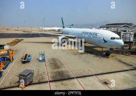 Hong Kong - March 1, 2023: Airplane at boarding gate jet bridge in Hong ...