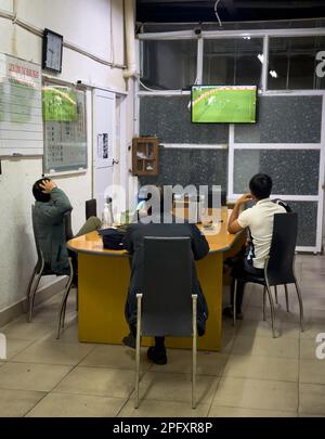 Fans watch a live broadcast of a World Cup soccer match between the U.S ...
