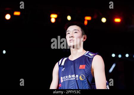 China's Li Shi Feng walks out to play Denmark's Anders Antonsen during ...