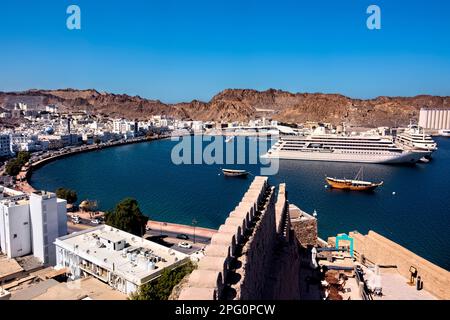 View of the corniche and Mutrah Harbor from the old fort and watch ...