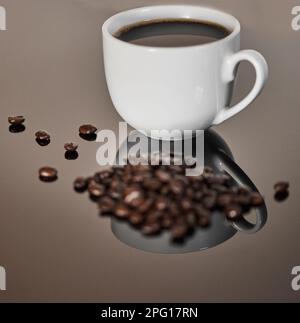 Coffee bean on a reflective surface. Macro. High quality photo Stock ...