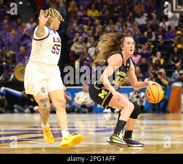 Michigan guard Leigha Brown (32) dribbles the ball during the second ...