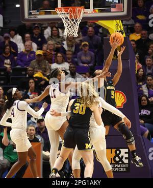 Michigan guard Laila Phelia (5) shoots against LSU forward Angel Reese ...