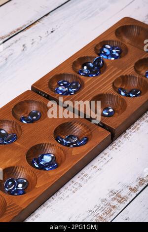 Mangala game board and glass marbles. Historical Turkish game mangala ...