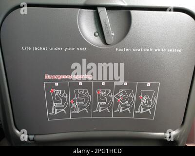 instructions on how to open emergency door in emergency exit row ...