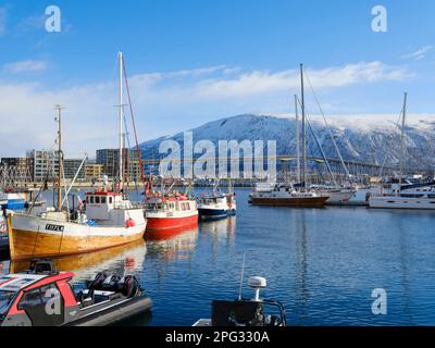 The harbour. Tromso or Tromsoe during winter in the northern part of ...