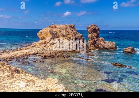 Ong Jmal Beach. Rocky Shoreline with Clear Blue Skies in Bizerte ...
