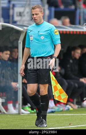 ROTTERDAM, NETHERLANDS - MARCH 1: Assistant referee Erik Koopman raises ...