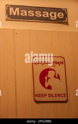 Bilingual sign inside a hotel, Phnom Penh, Cambodia. © Kraig Lieb Stock ...