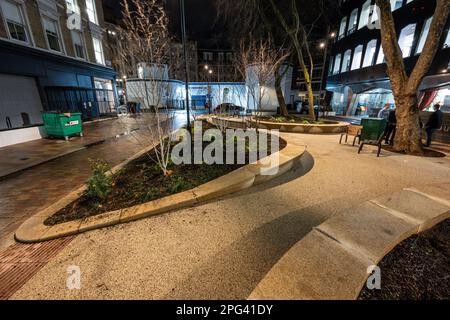 Flower borders, seating and play facilities fill Alfred Place in ...