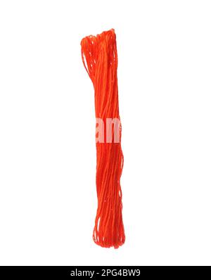 Bright orange embroidery thread on white background Stock Photo - Alamy
