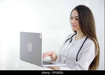 Doctor and patient discussing current health examination while sitting ...