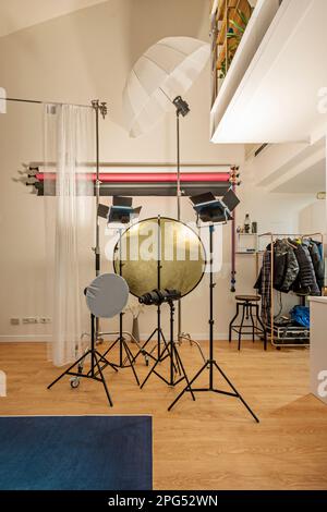 Photography studio with diffusers, backgrounds, spotlights and other ...