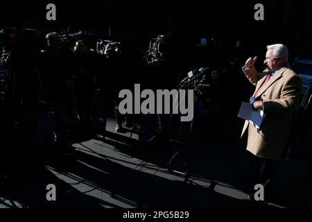 Attorney Bob Costello, right, talks to reporters after testifying ...
