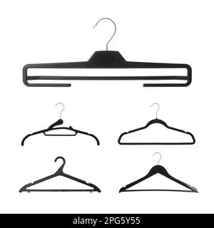 Set with different empty hangers on white background Stock Photo - Alamy