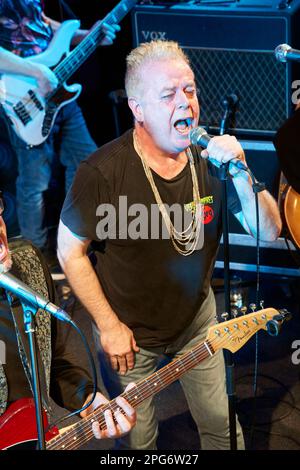 Punk producer and singer Mike Bennett performing with The Blockheads at ...