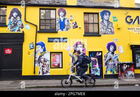 People walk past GAK musical instrument shop in the trendy North Laine ...