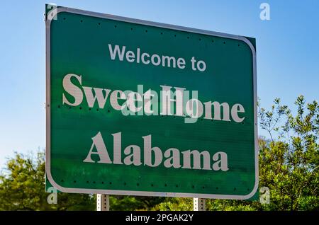 A sign welcomes visitors to the State of Alabama and the Alabama ...