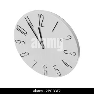 Clock showing five minutes until midnight on white background. New Year ...