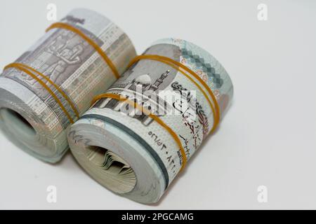 5 EGP LE five Egyptian pounds cash money bills rolled up with rubber ...