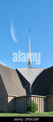 A spire and a cross surmount the christian anglican church, constructed ...