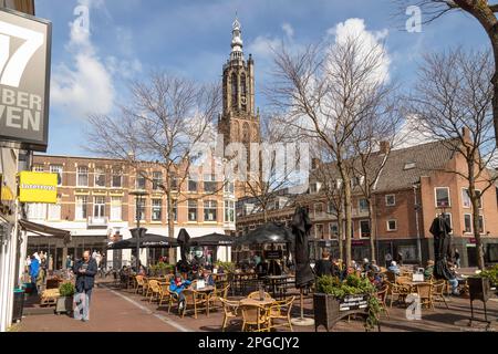 Cozy square with terraces and a view of the church tower - Our Lady ...