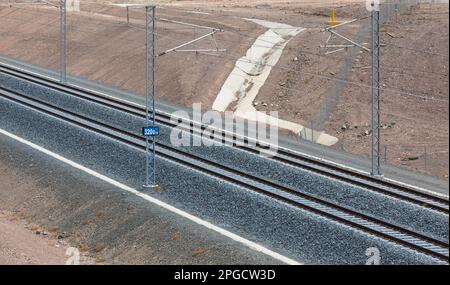 Aerial view of dry mountains with digging under infrastructure ...