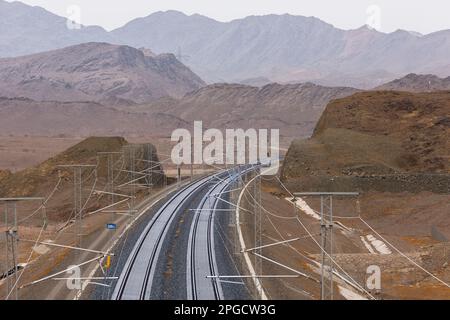 Aerial view of dry mountains with digging under infrastructure ...