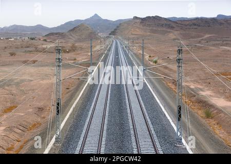 Aerial view of dry mountains with digging under infrastructure ...